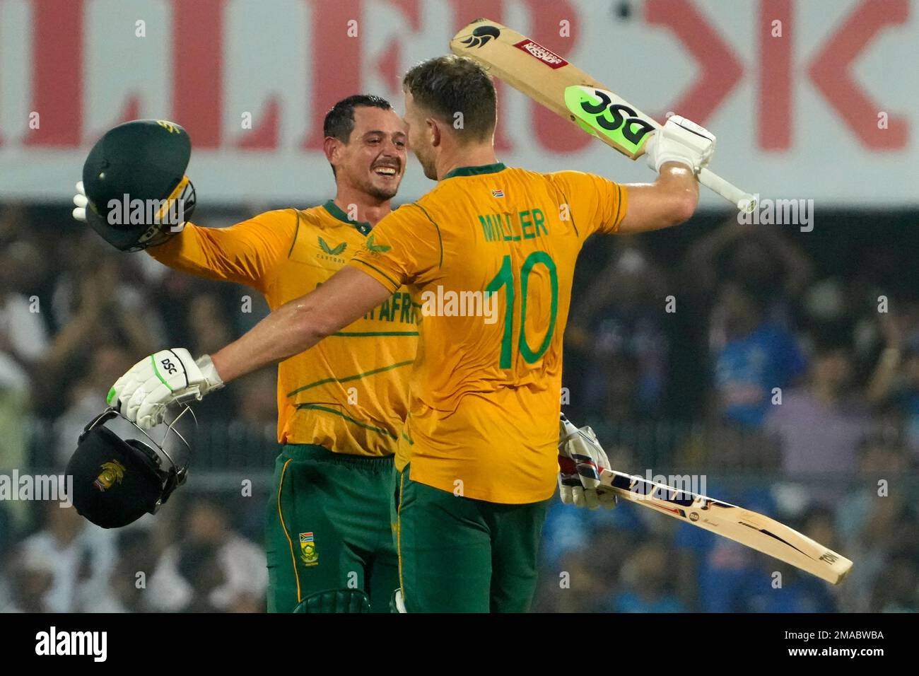 South Africa's David Miller, right, celebrates with batting partner ...