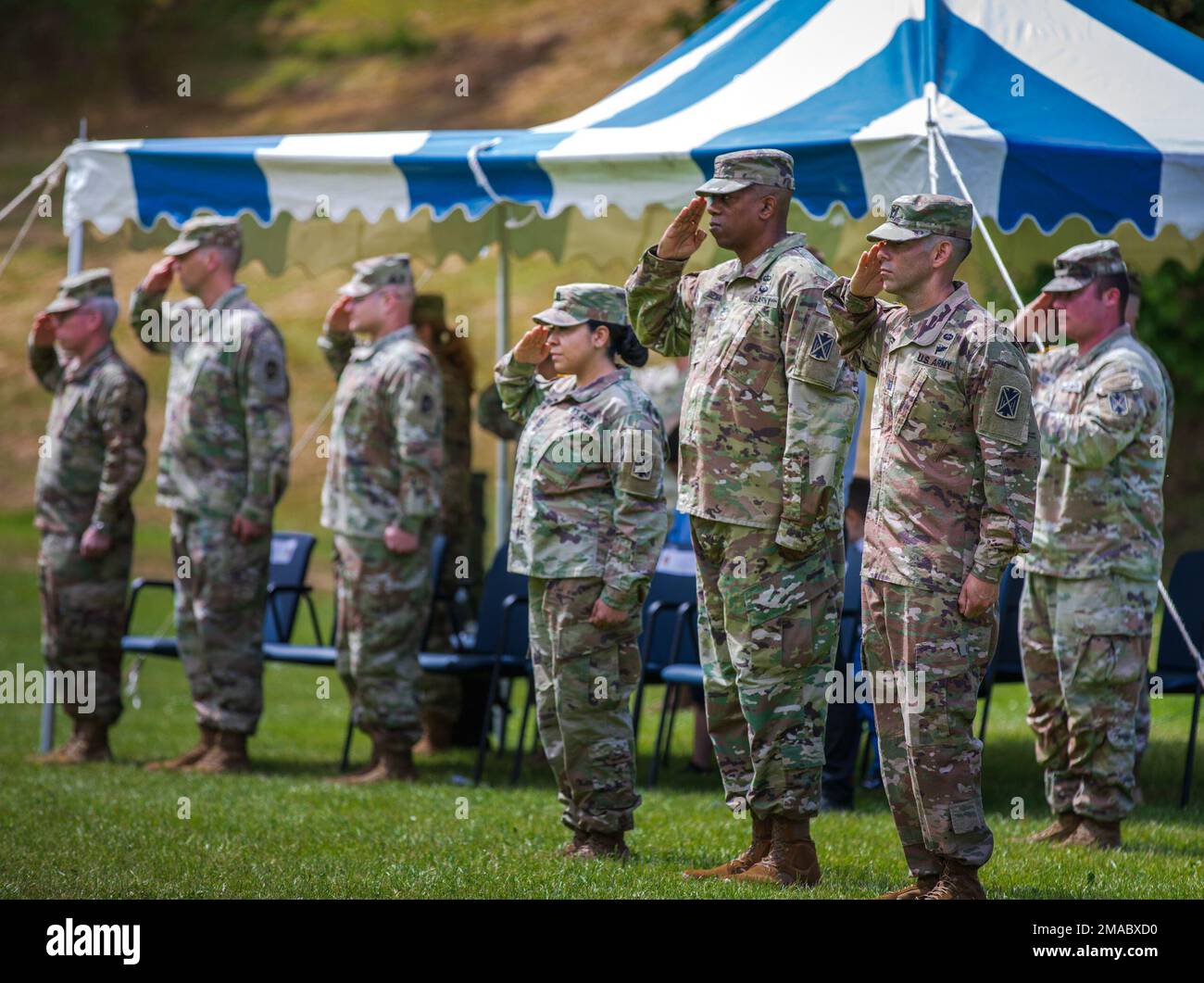 U.S. Army Capt. Mellorie Clinton (left), Col Tony Dedmond (center), and ...