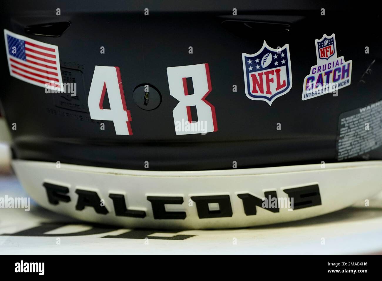 Atlanta Falcons Liam McCullough's helmet is sits on the bench before ...