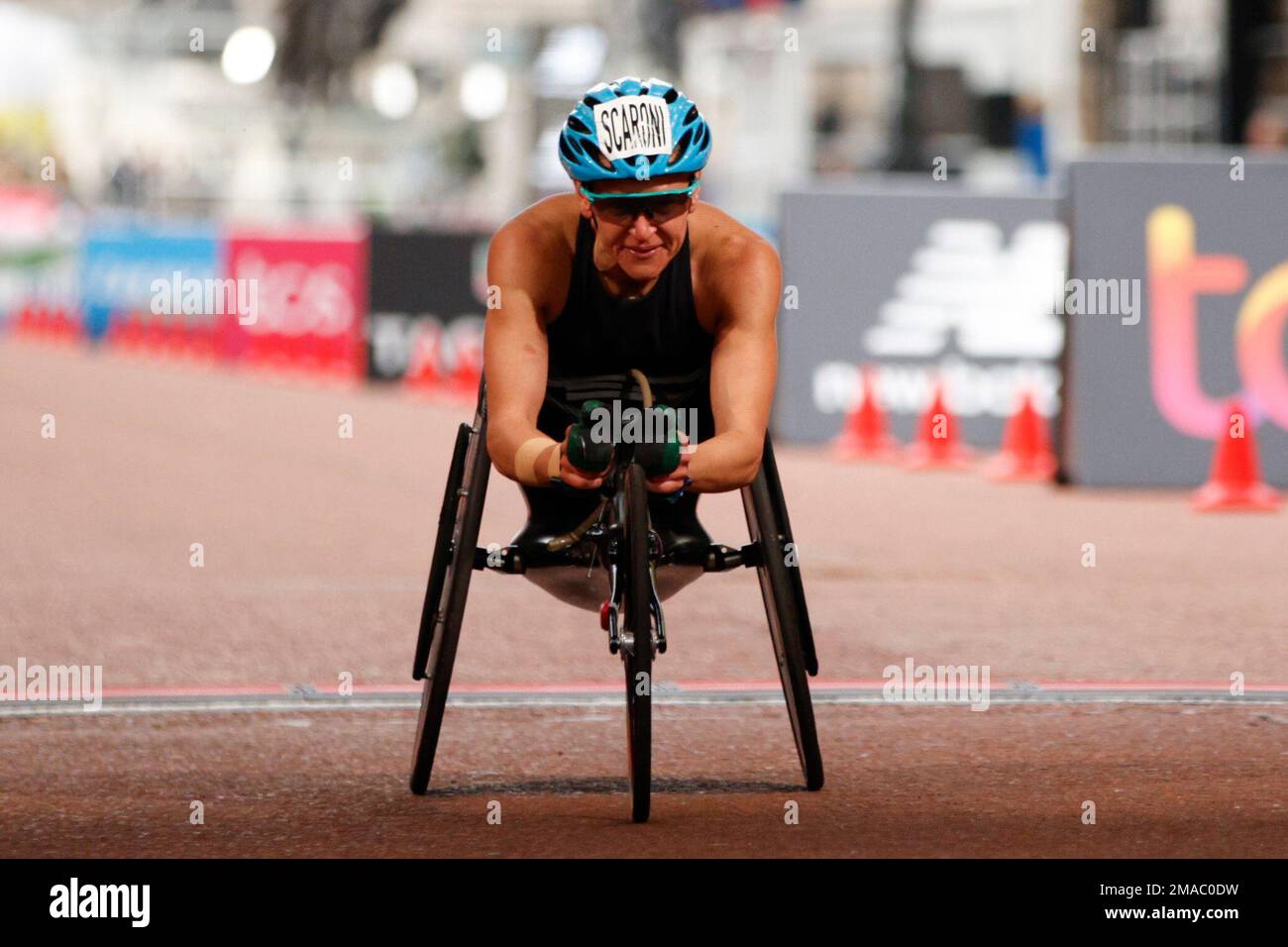 Susannah Scaroni of the United States crosses the line in second place ...