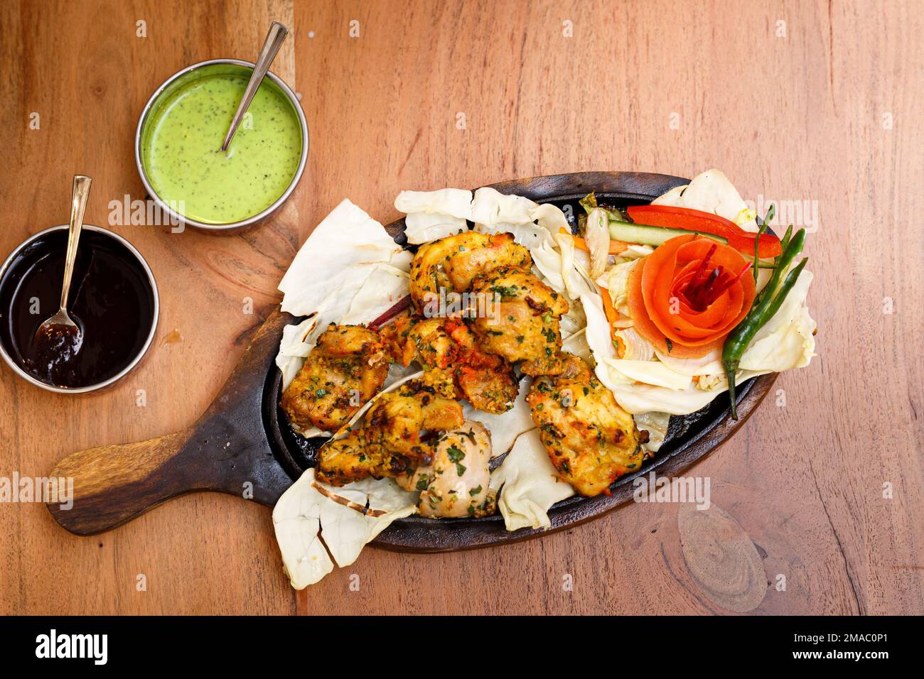 Indian food. Indian barbecue is cooked in the oven Stock Photo - Alamy