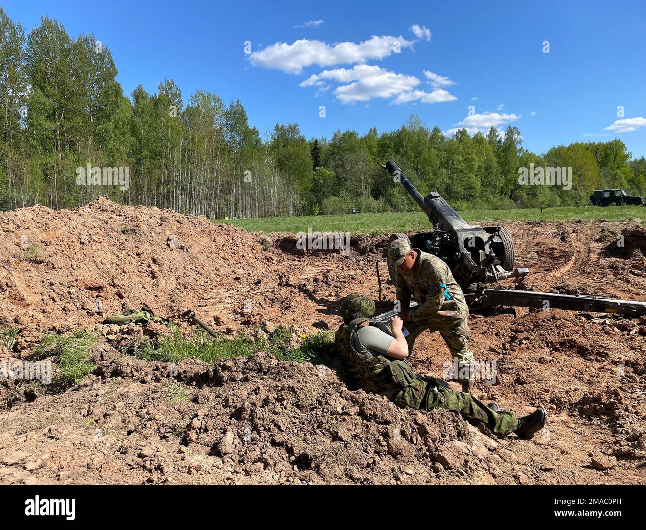 U.S. Army Spc. Jose Landaverde assesses the wounds of a mock causality ...