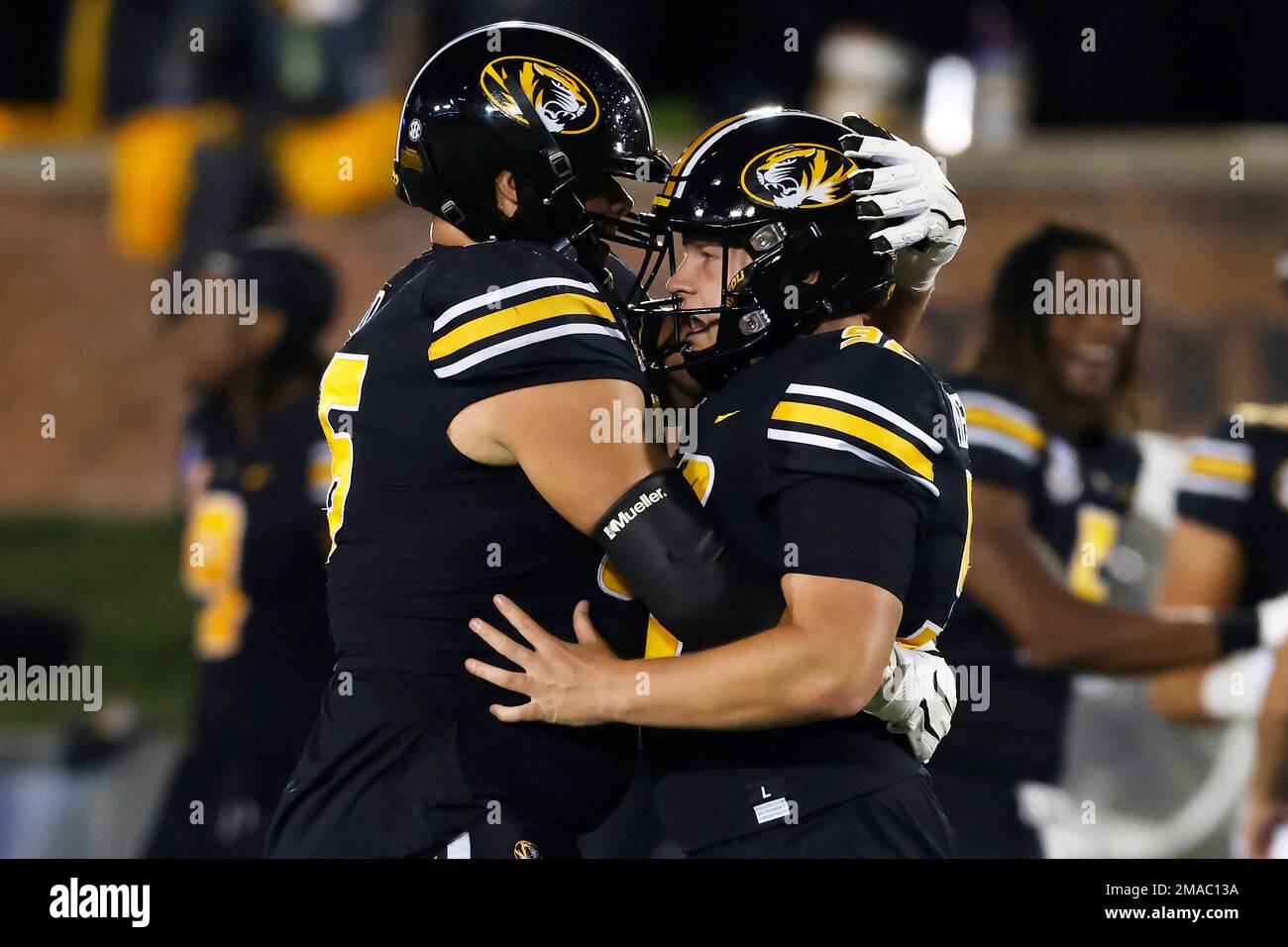 Missouri offensive lineman Connor Wood, left, congratulates Harrison ...