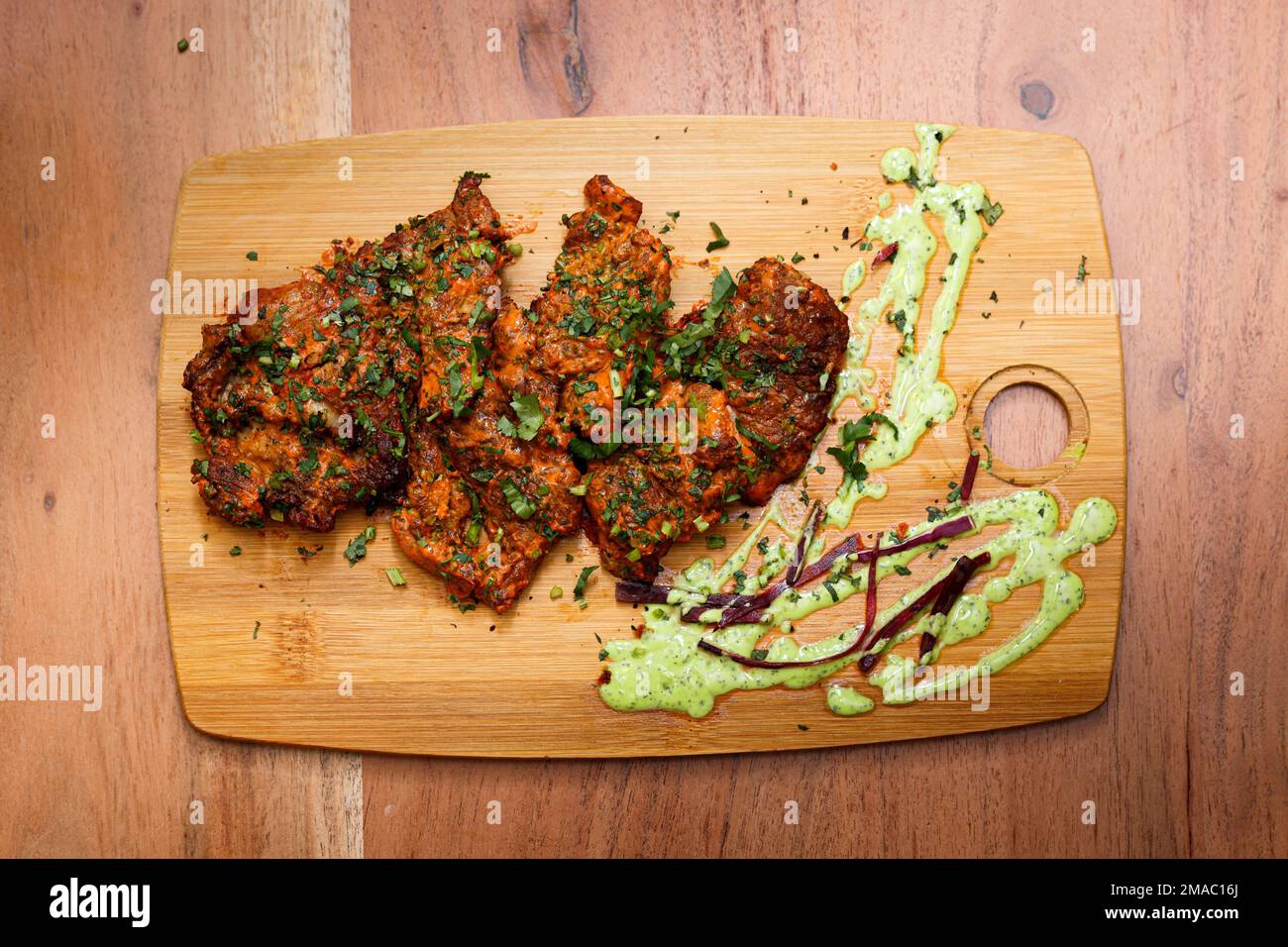 Indian food. Indian barbecue is cooked in the oven Stock Photo - Alamy