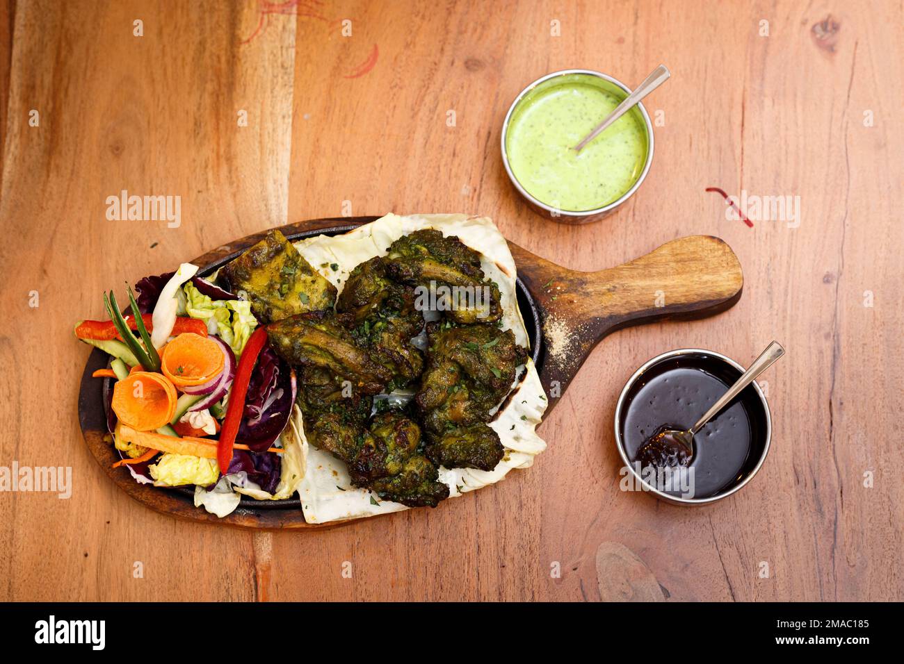Indian food. Indian barbecue is cooked in the oven Stock Photo - Alamy