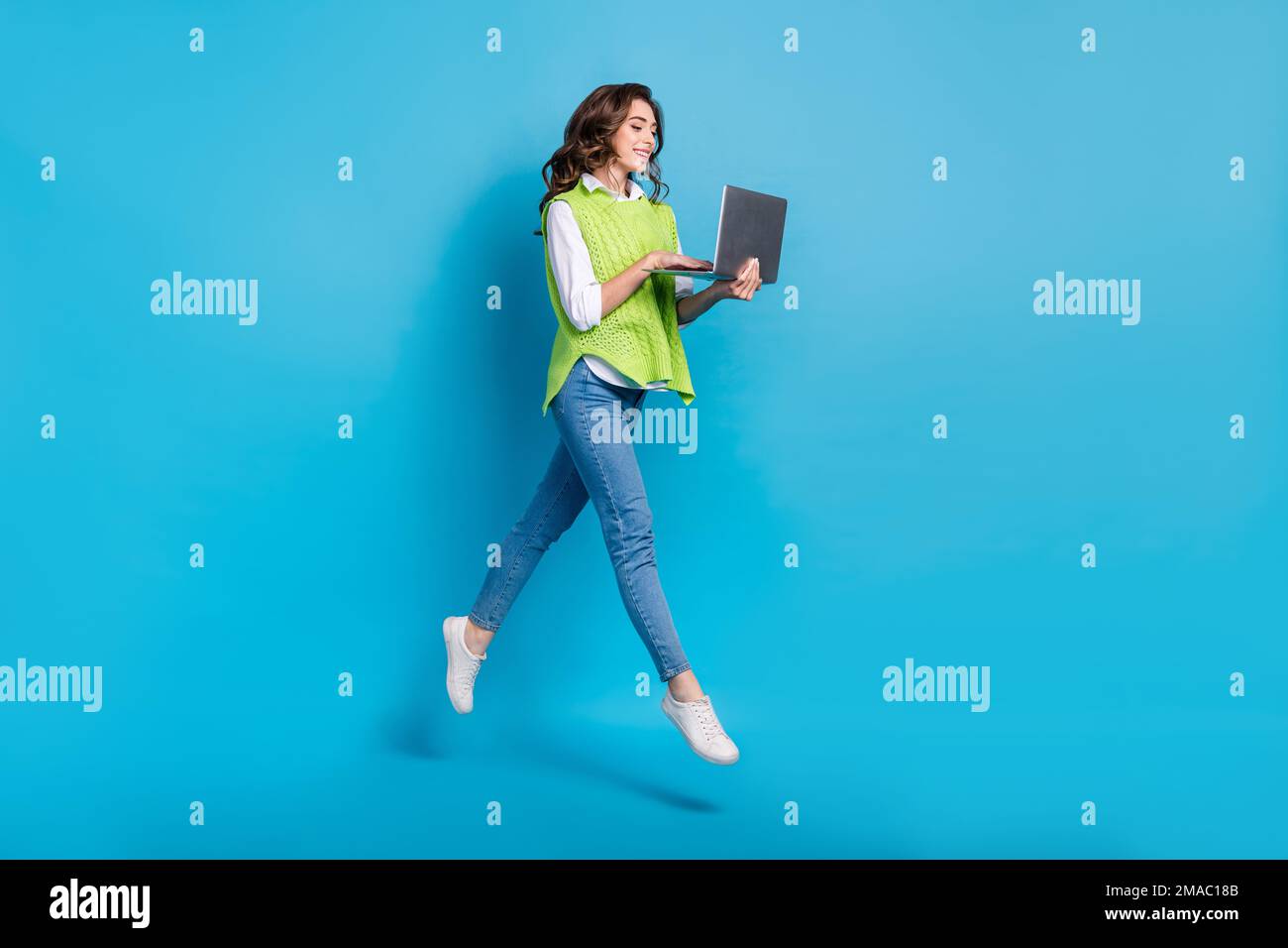 Full body profile portrait of active energetic person jump rush use ...