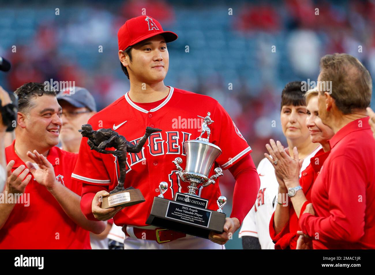 Los Angeles Angels' Shohei Ohtani (17) receives the Nick Adenhart and ...