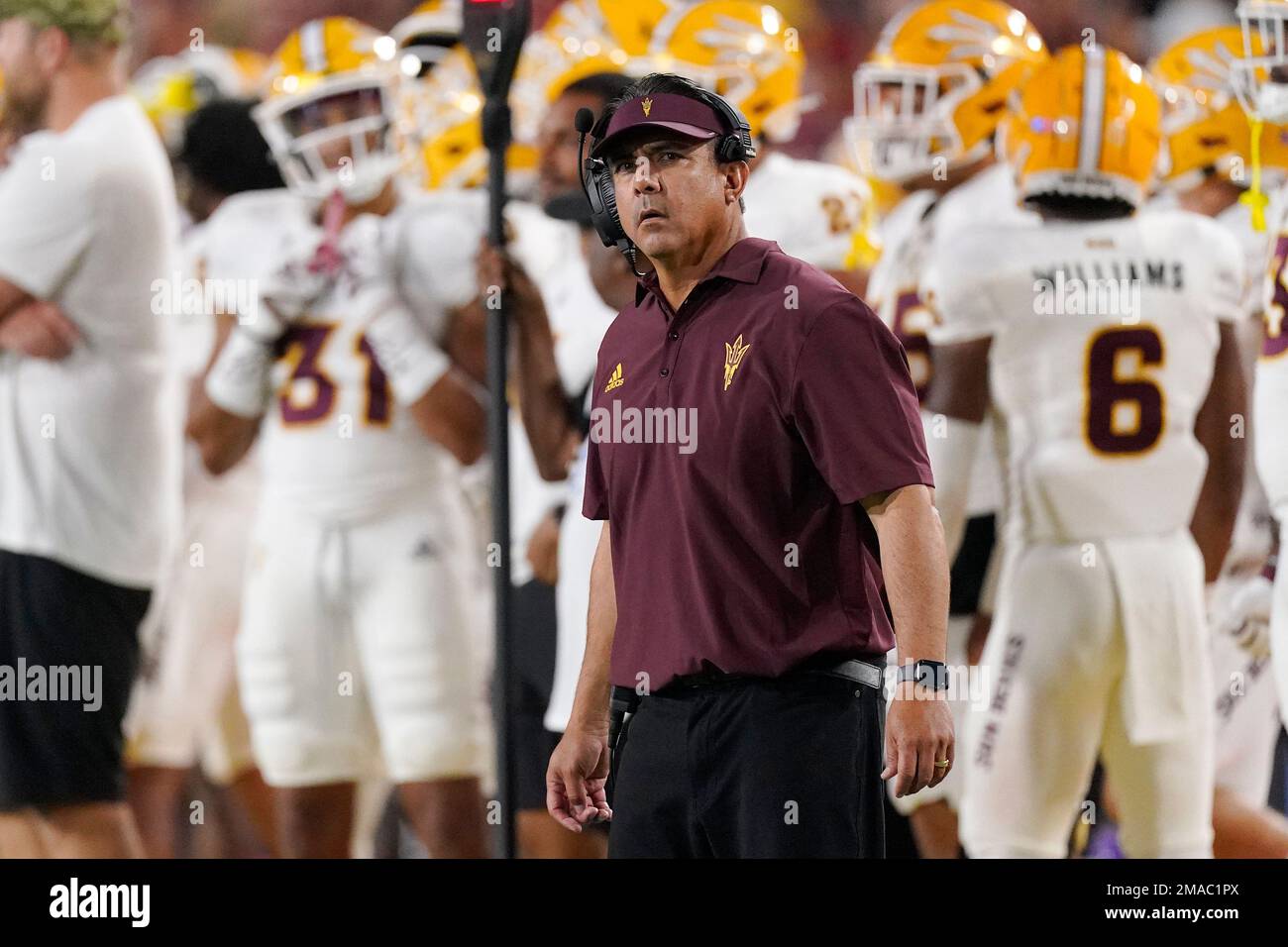 Arizona State head coach Shaun Aguano stands on the sideline during the ...