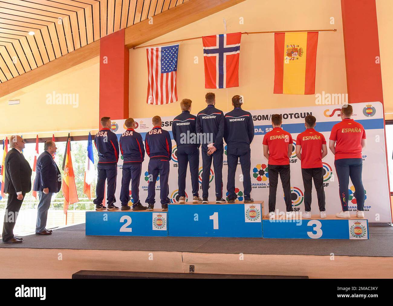 Sergeants Tim Sherry, Ivan Roe and Brandon Muske stand on the podium ...