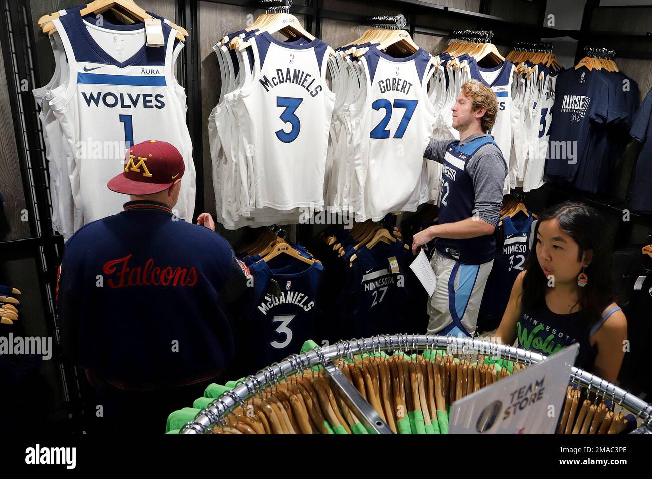 Minnesota Timberwolves fans look at merchandise before the NBA ...