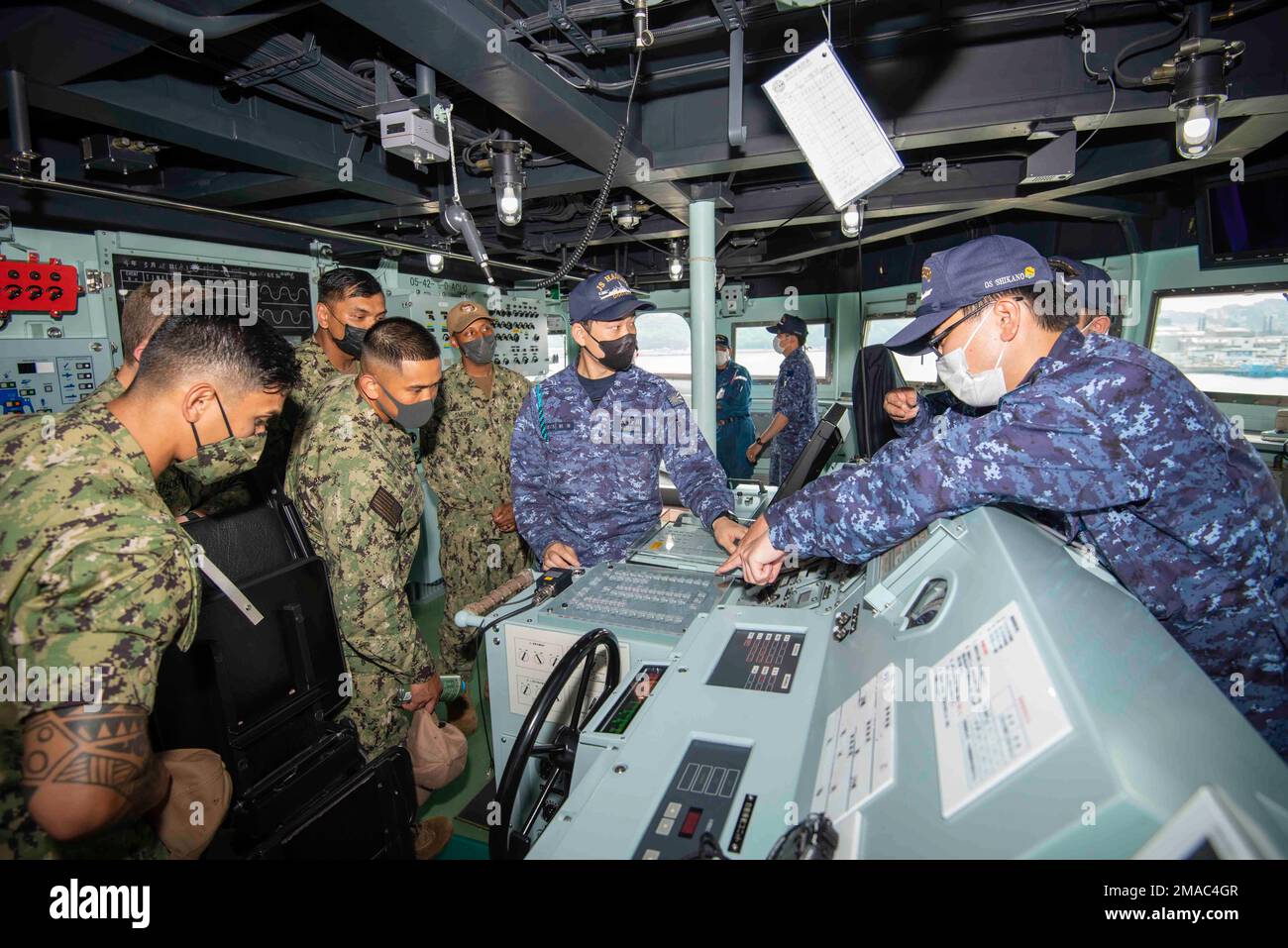 Sailors assigned to Commander, Fleet Activities Sasebo (CFAS), local ...