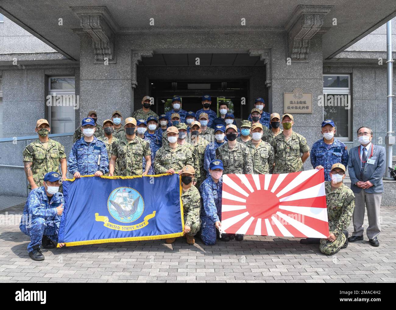 Sailors assigned to Commander, Fleet Activities Sasebo and local tenant ...