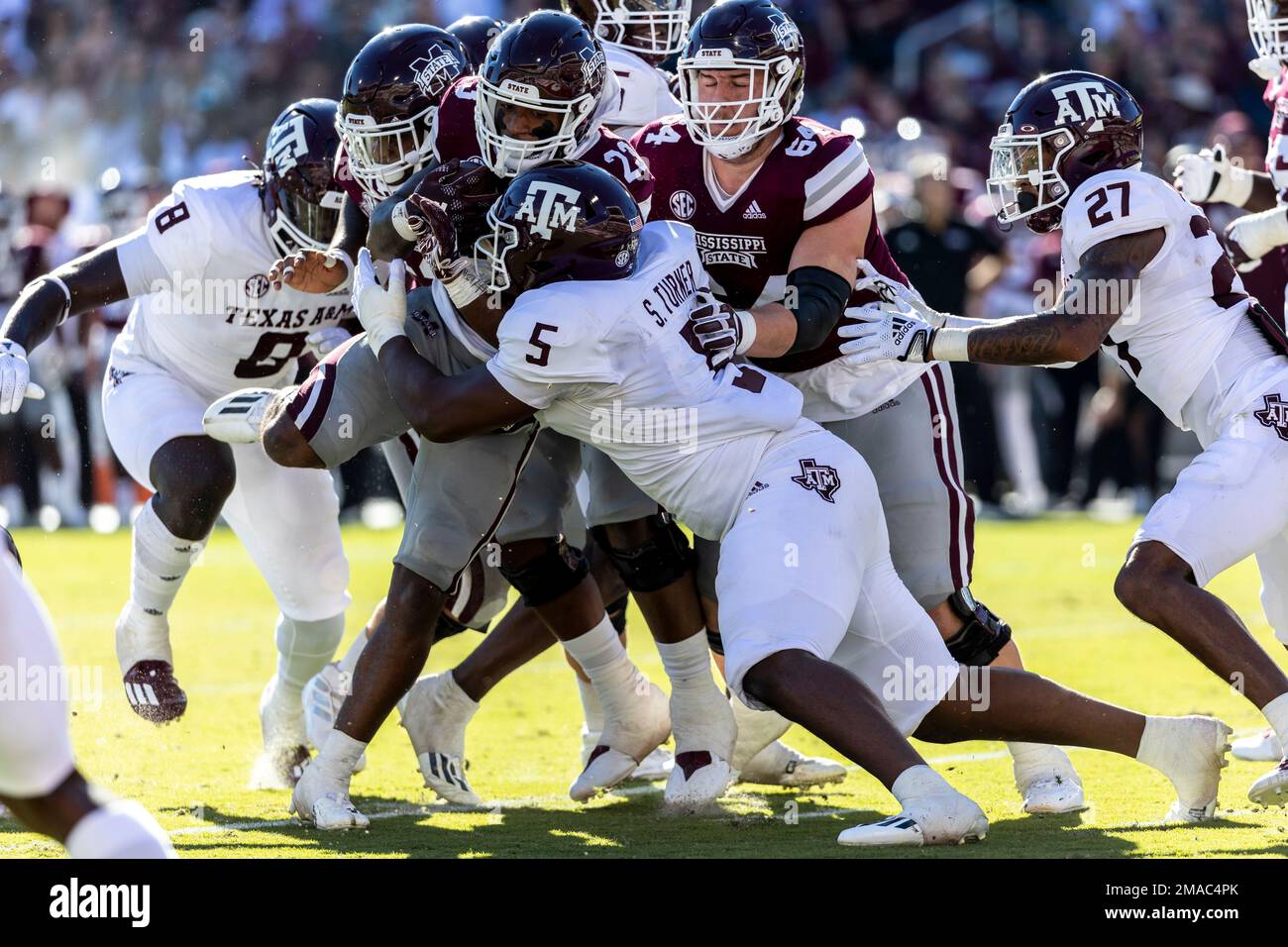 Texas A&M defensive lineman Shemar Turner (5) stops Mississippi State ...