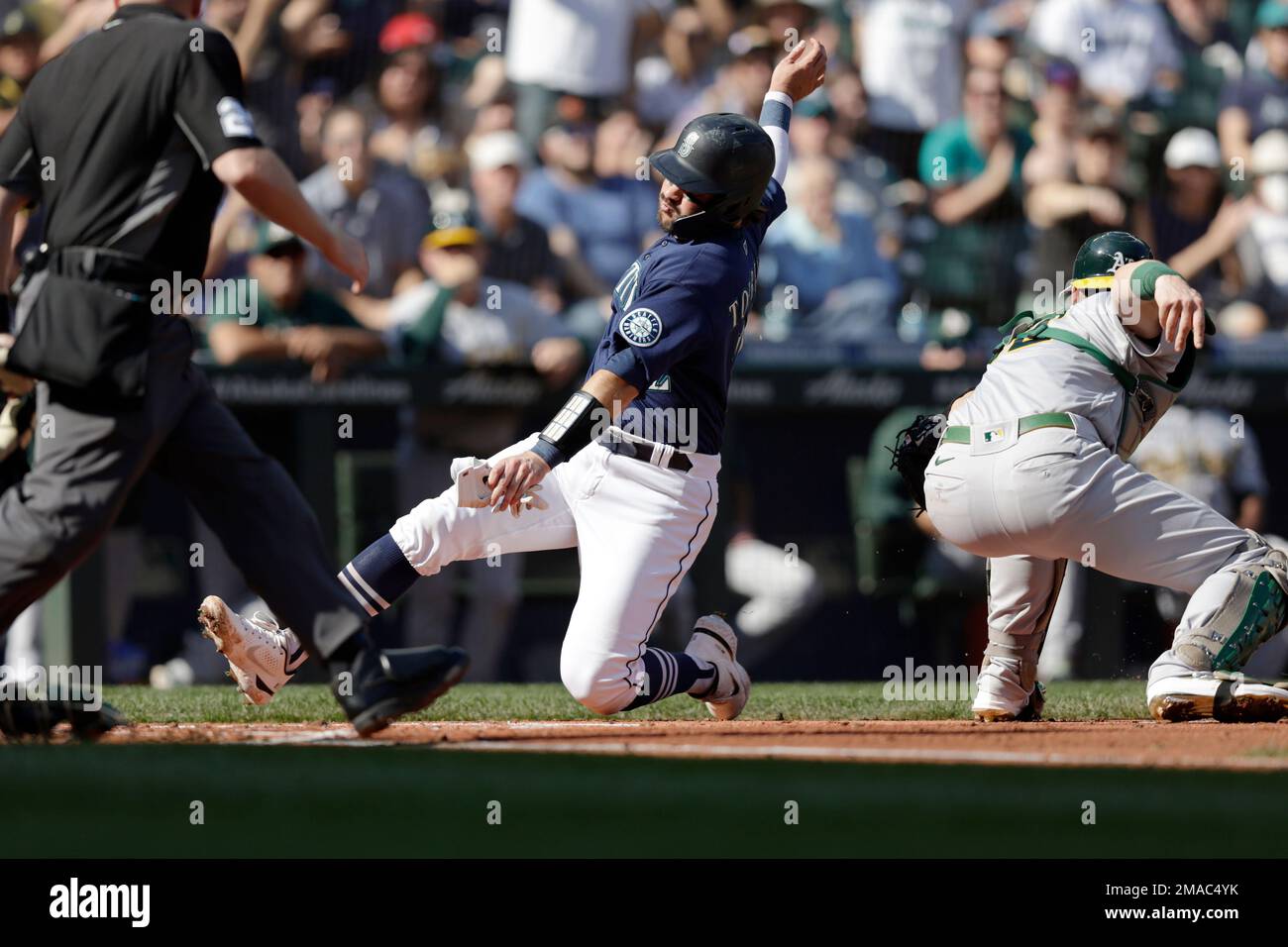 Seattle Mariners' Luis Torrens scored past the Oakland Athletics ...