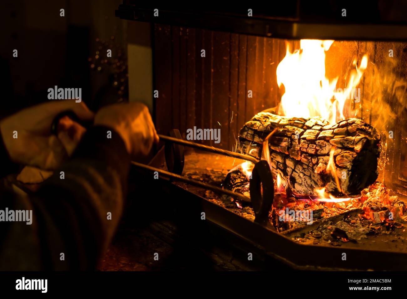 Log of wood burning in a fireplace inside a house, hearth Stock Photo ...