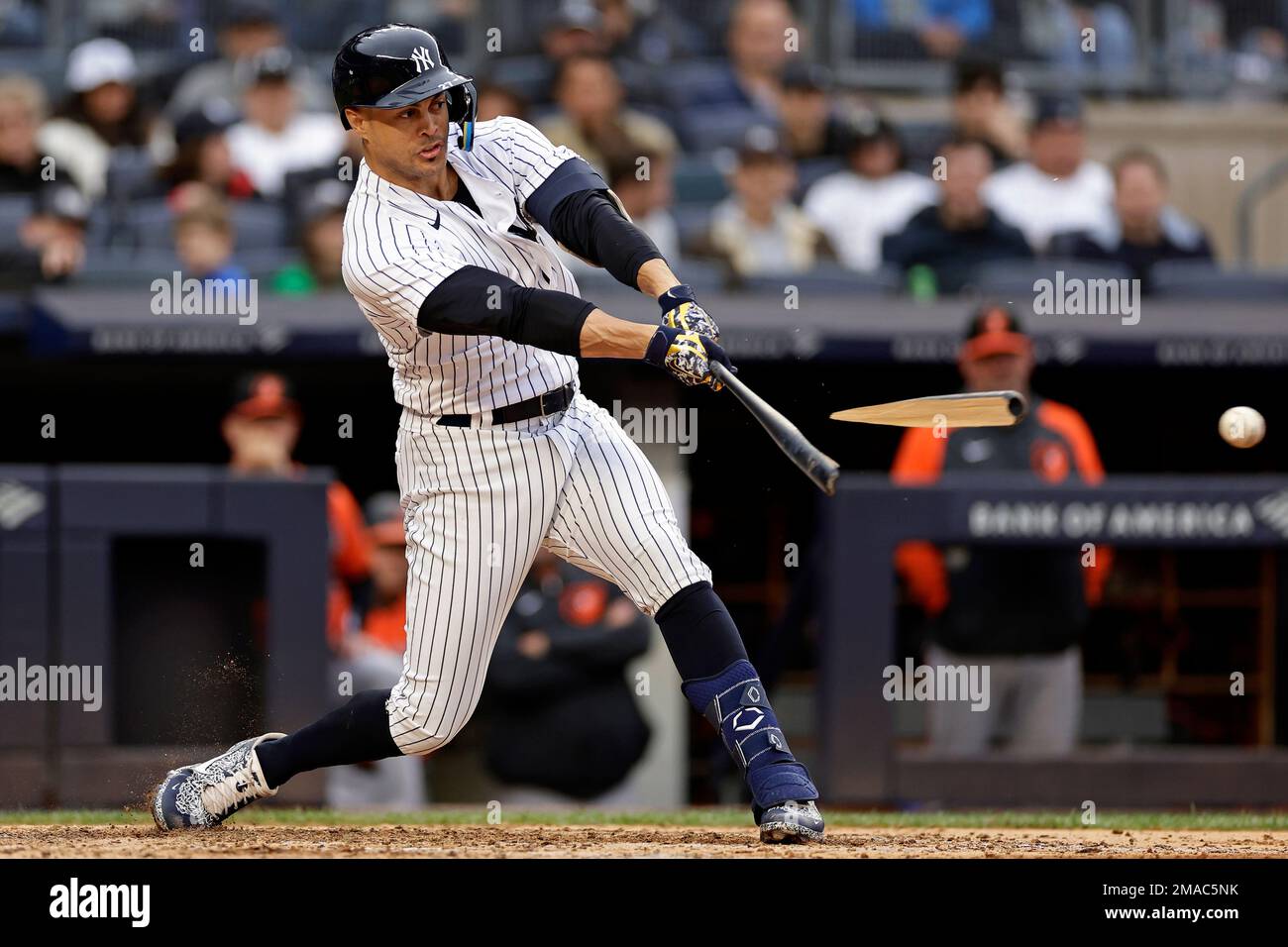 New York Yankees designated hitter Giancarlo Stanton breaks his bat on ...