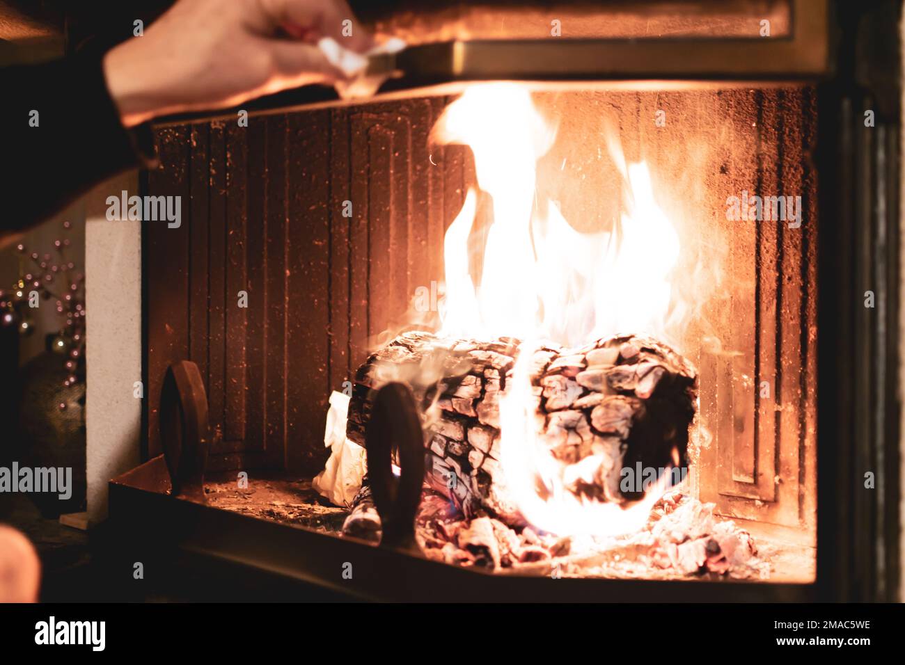 Log of wood burning in a fireplace inside a house, hearth Stock Photo ...