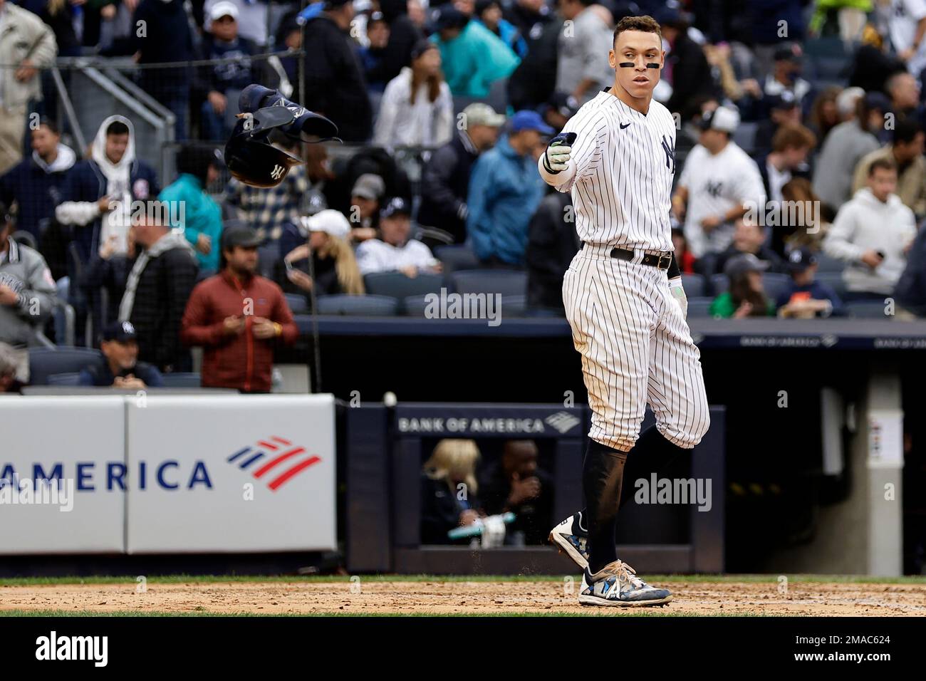 New York Yankees' Aaron Judge tosses his batting gear after striking ...