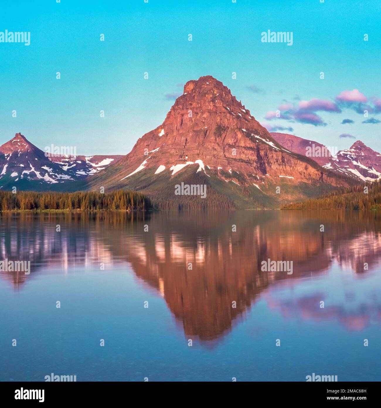 morning light on sinopah mountain and two medicine lake in glacier ...