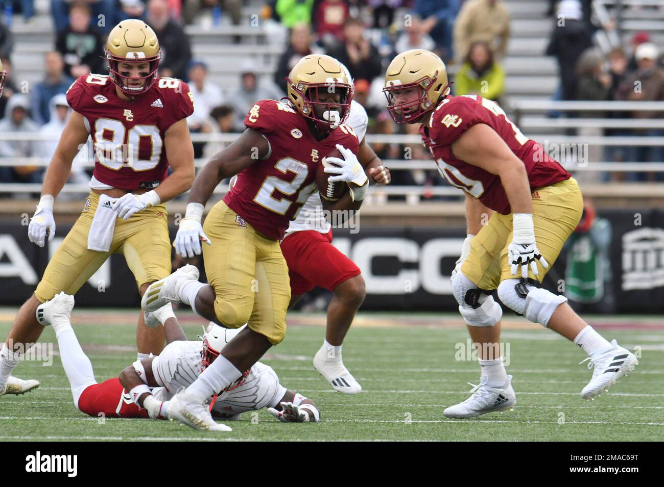 Boston College running back Pat Garwo eludes a Louisville defenseman ...