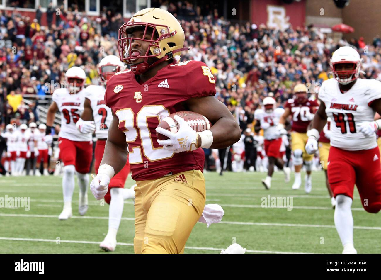 Boston College running back Alex Broome runs into the endzone to score ...