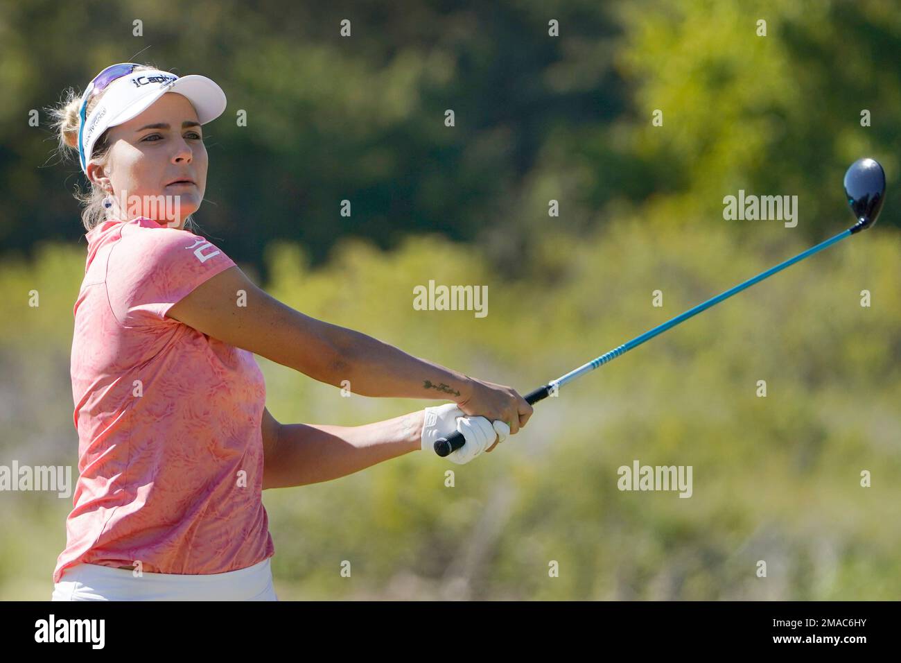 Lexi Thompson watches her tee shot on the eighth hole during the LPGA ...