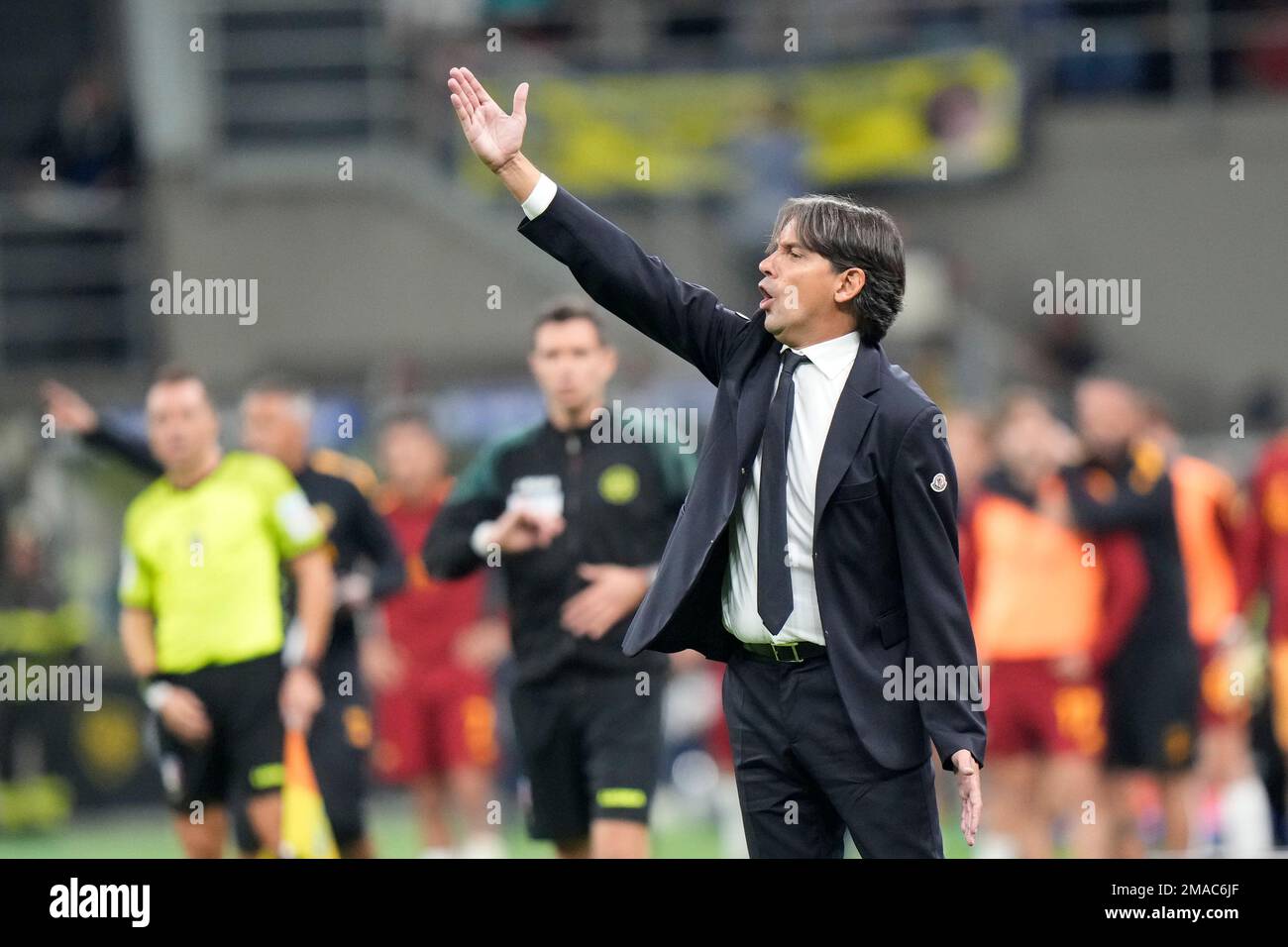 Inter Milan's head coach Simone Inzaghi gives directions to his players ...