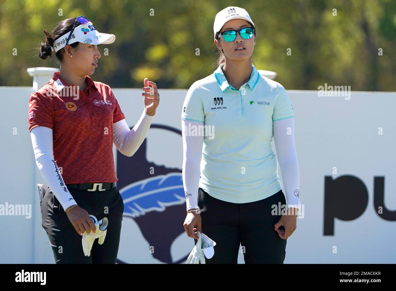 Xiyu Janet Lin of China, right, and Atthaya Thitikul of Thailand chat ...