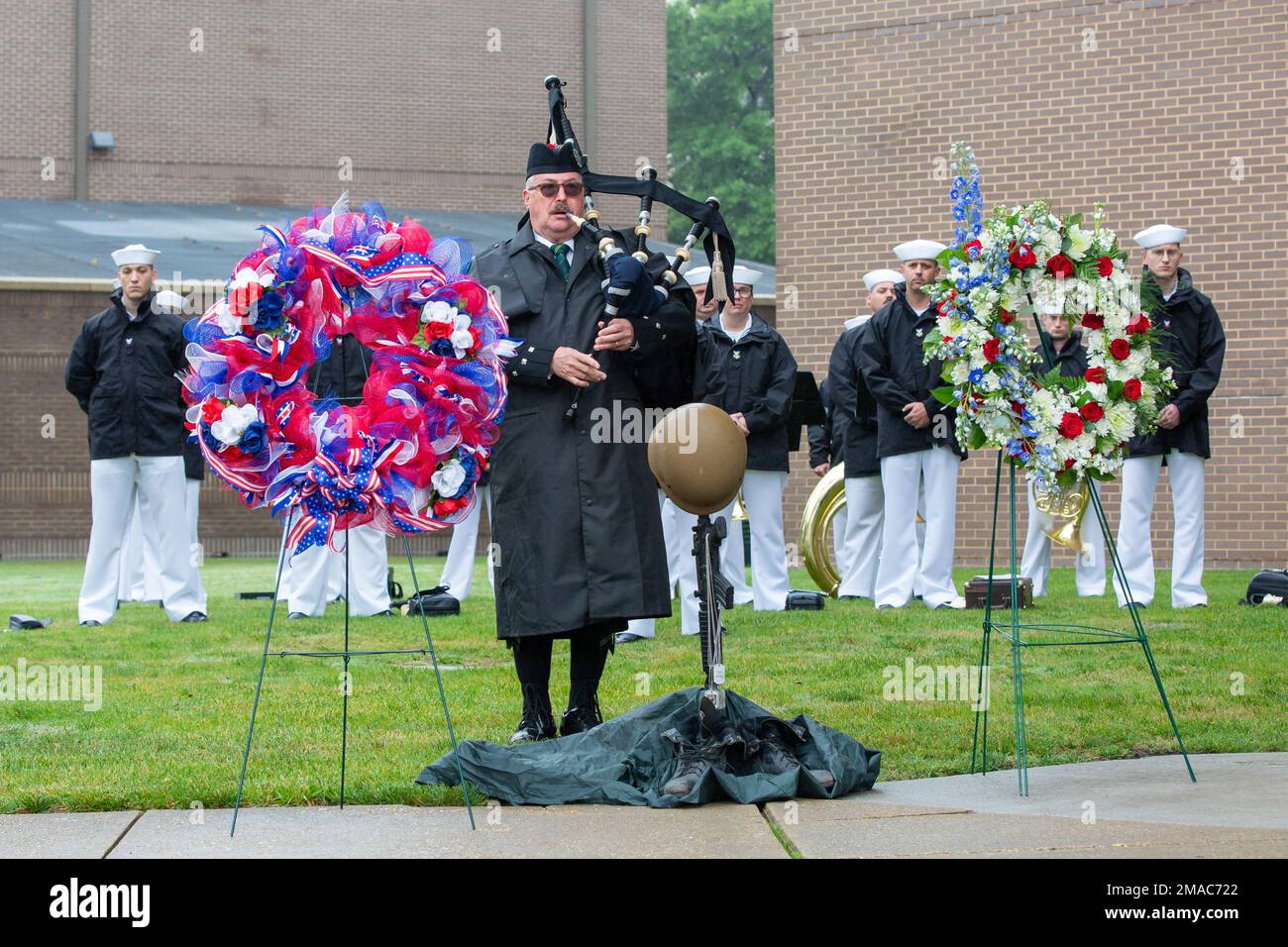 Bagpiper Tom Metz, a retired Lt. Col. from the United States Army ...