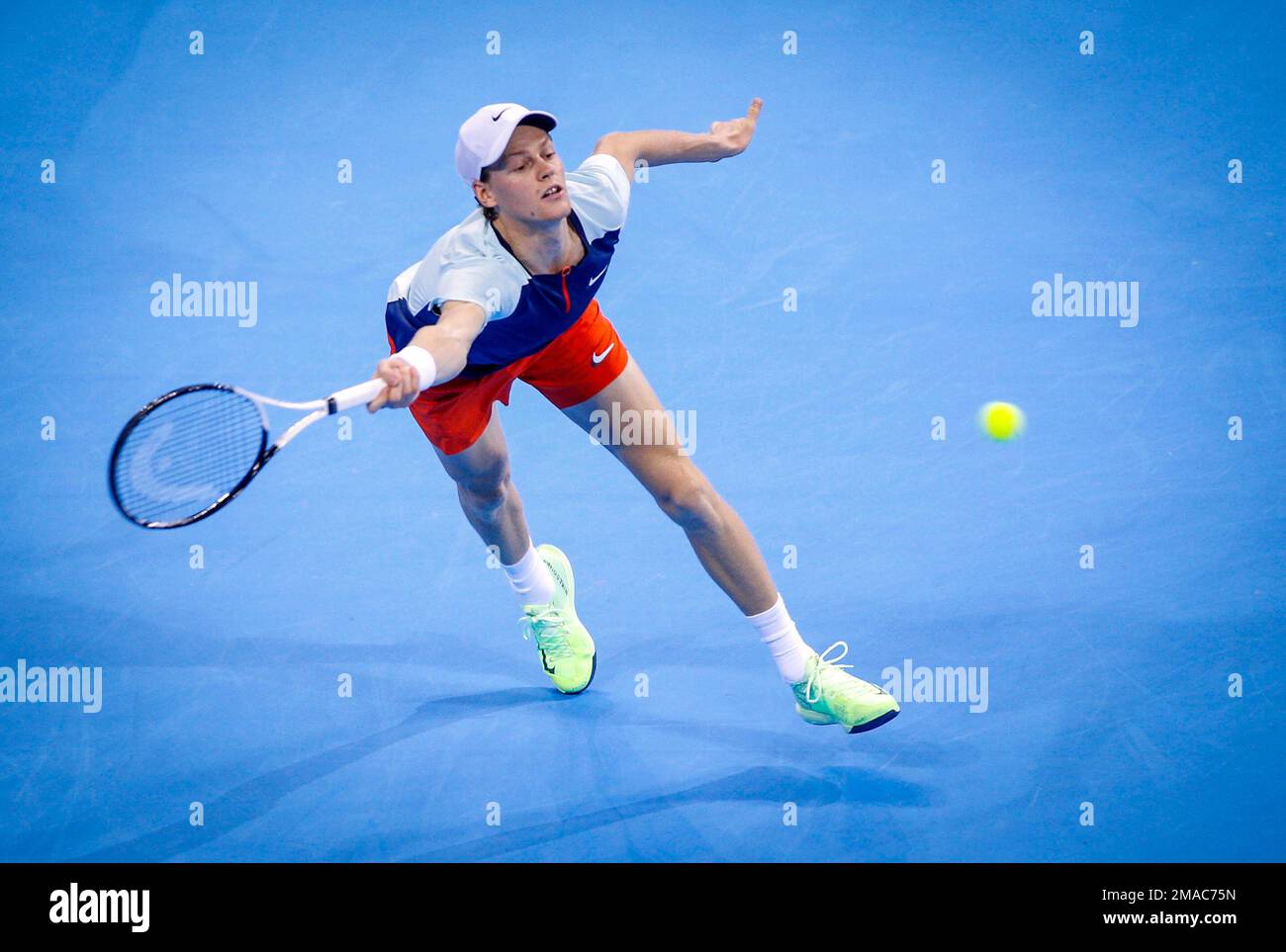 Italy's Jannik Sinner returns a shot during his semifinal match against Holger Rune of Denmark ...