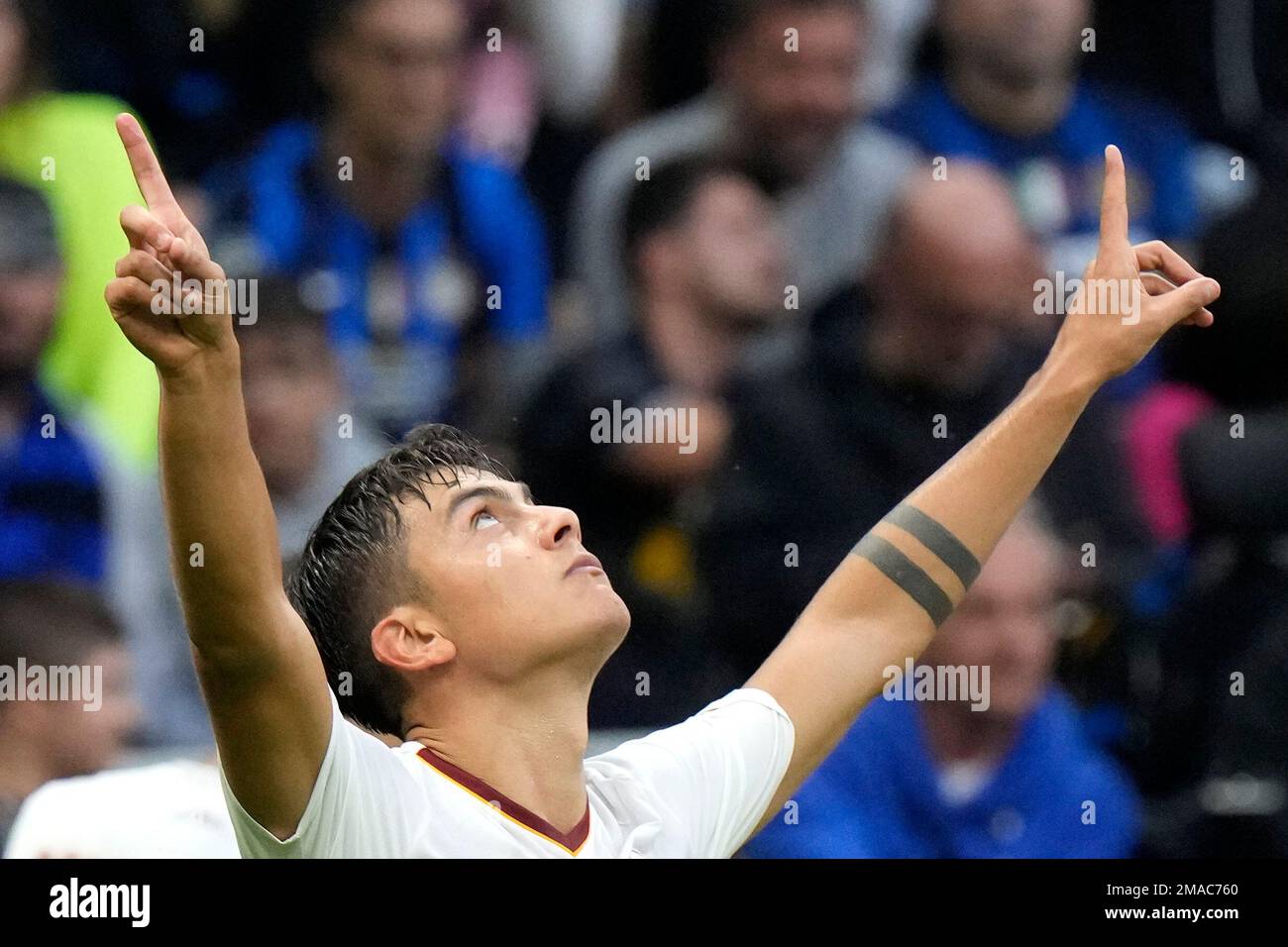 Roma's Paulo Dybala celebrates after scoring his side's first goal ...