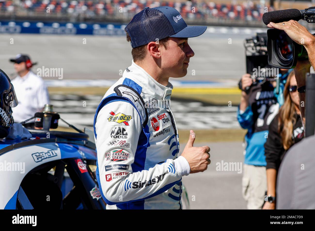 Christopher Bell reacts after taking the pole position during ...