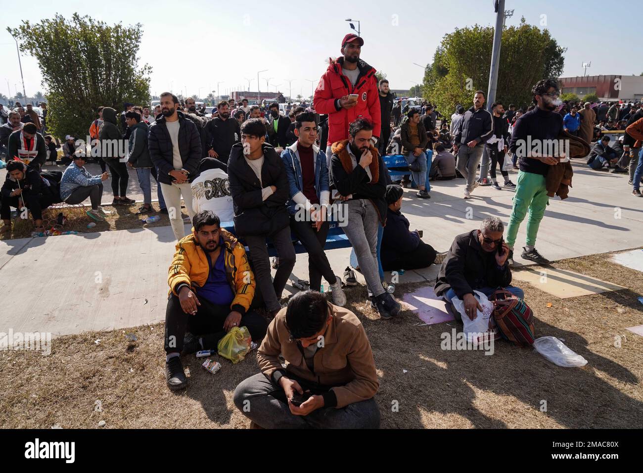 Basrah, Iraq. 19th Jan, 2023. Football fans crowd outside the Jaza·a Al ...