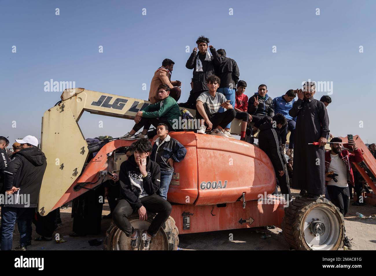 Basrah, Iraq. 19th Jan, 2023. Football fans crowd outside the Jaza·a Al ...