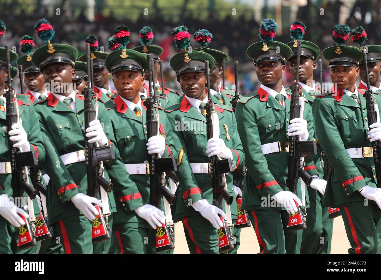 Nigerian soldiers march during 62nd anniversary celebrations of ...