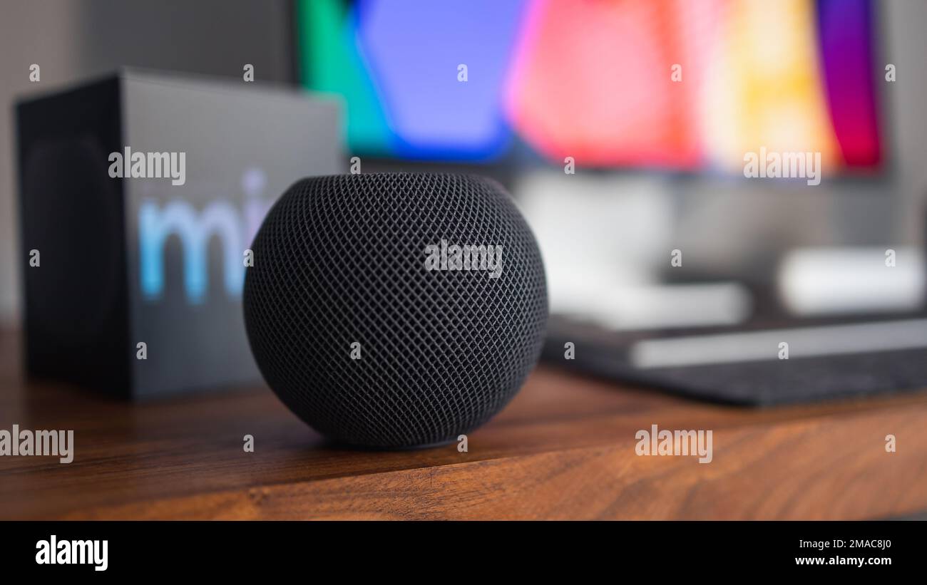 LONDON - AUGUST 16, 2022: Apple HomePod Mini smart speaker on minimal ...