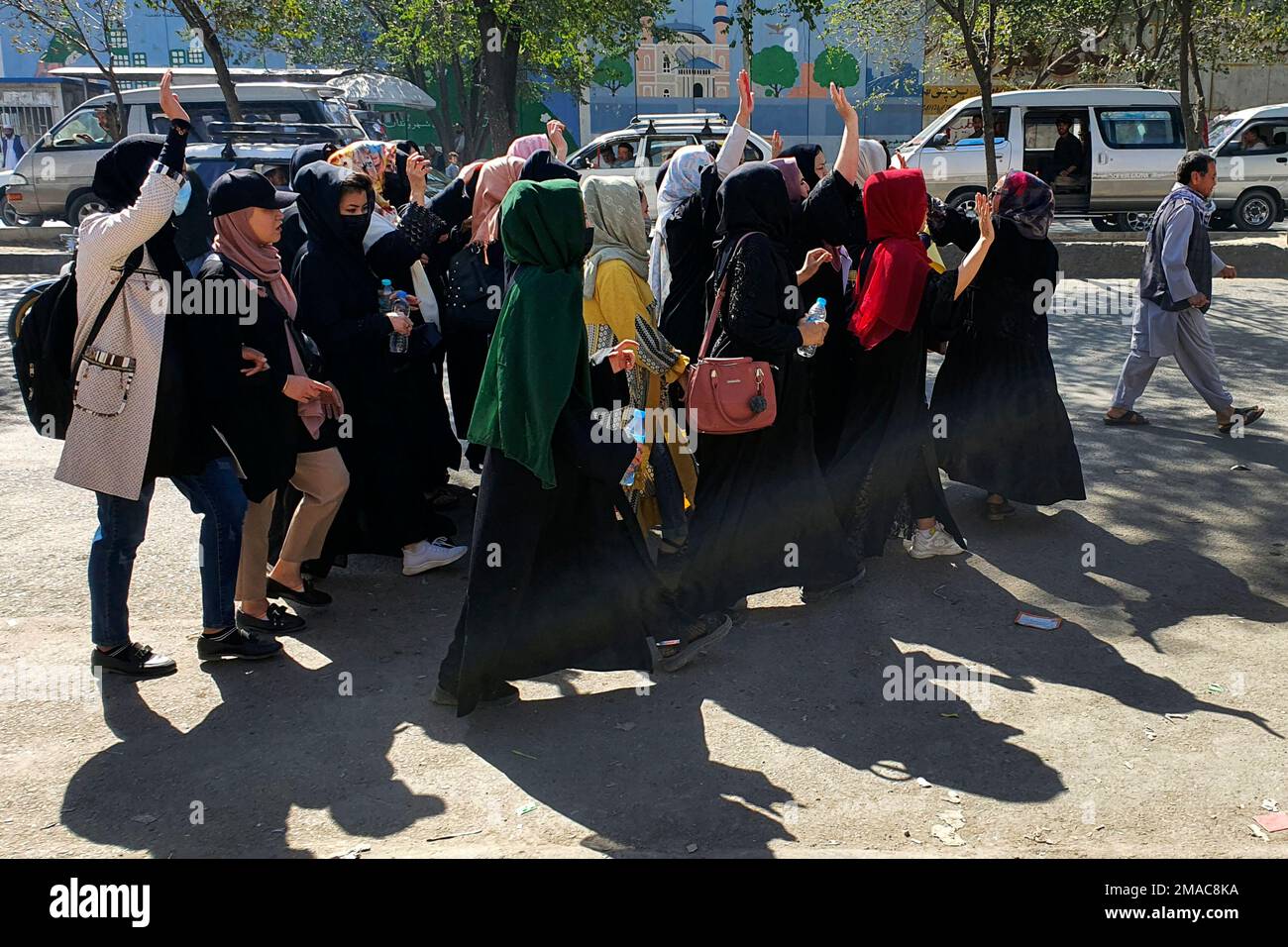 Afghan girls chant slogans during a protest they call "Stop Hazara ...