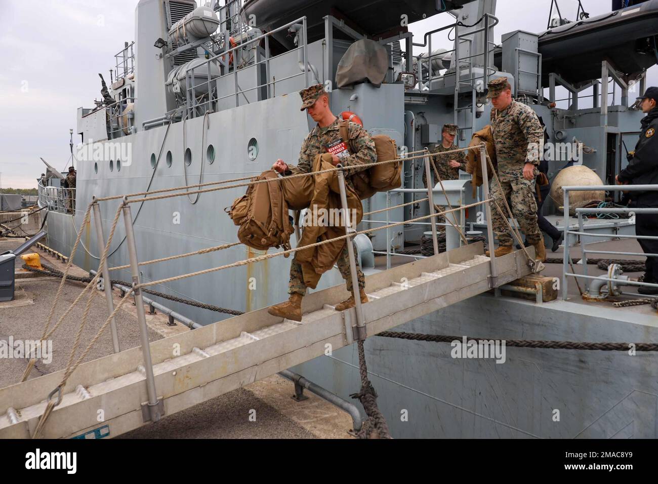 U.S. Marines attached to Task Group 61/2.4, Task Force 61/2, disembark ...