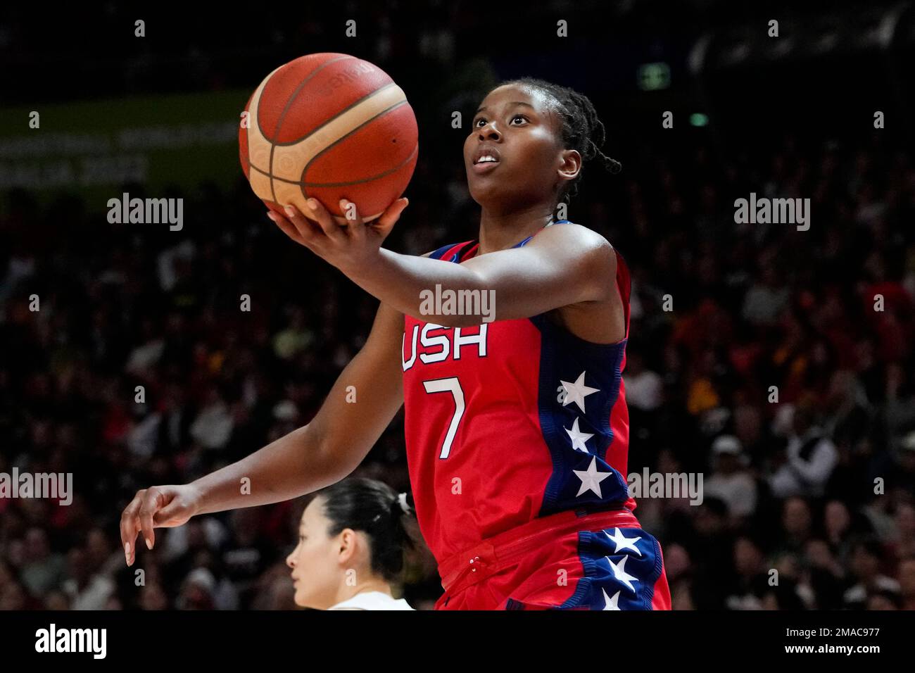United States' Ariel Atkins lays up to shoot for goal against China ...