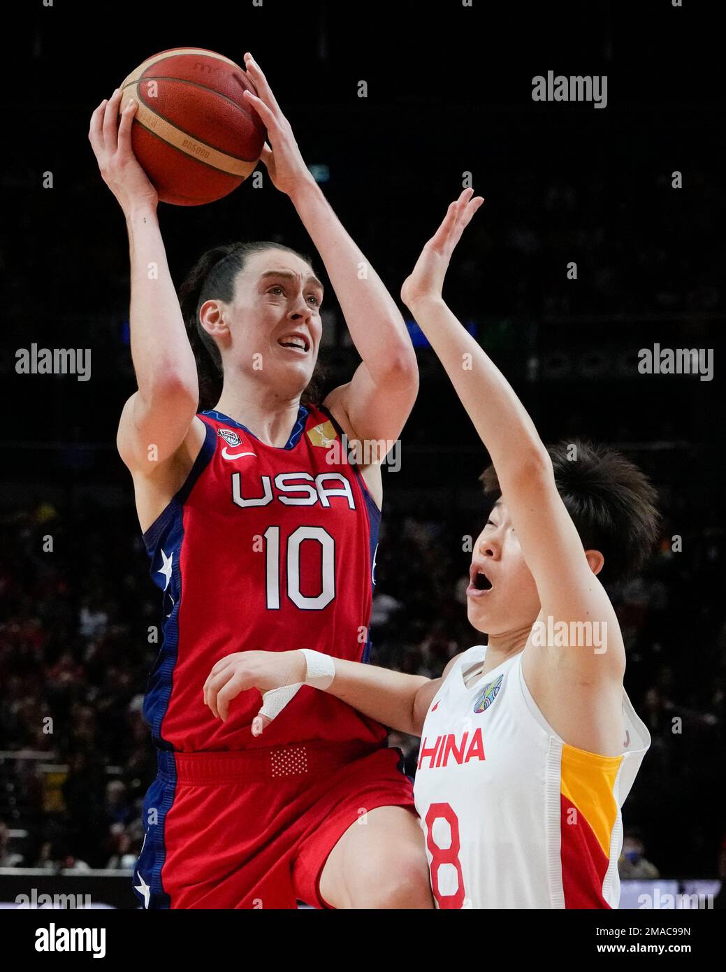 United States' Breanna Stewart lays up to shoot at goal as China's Jin ...