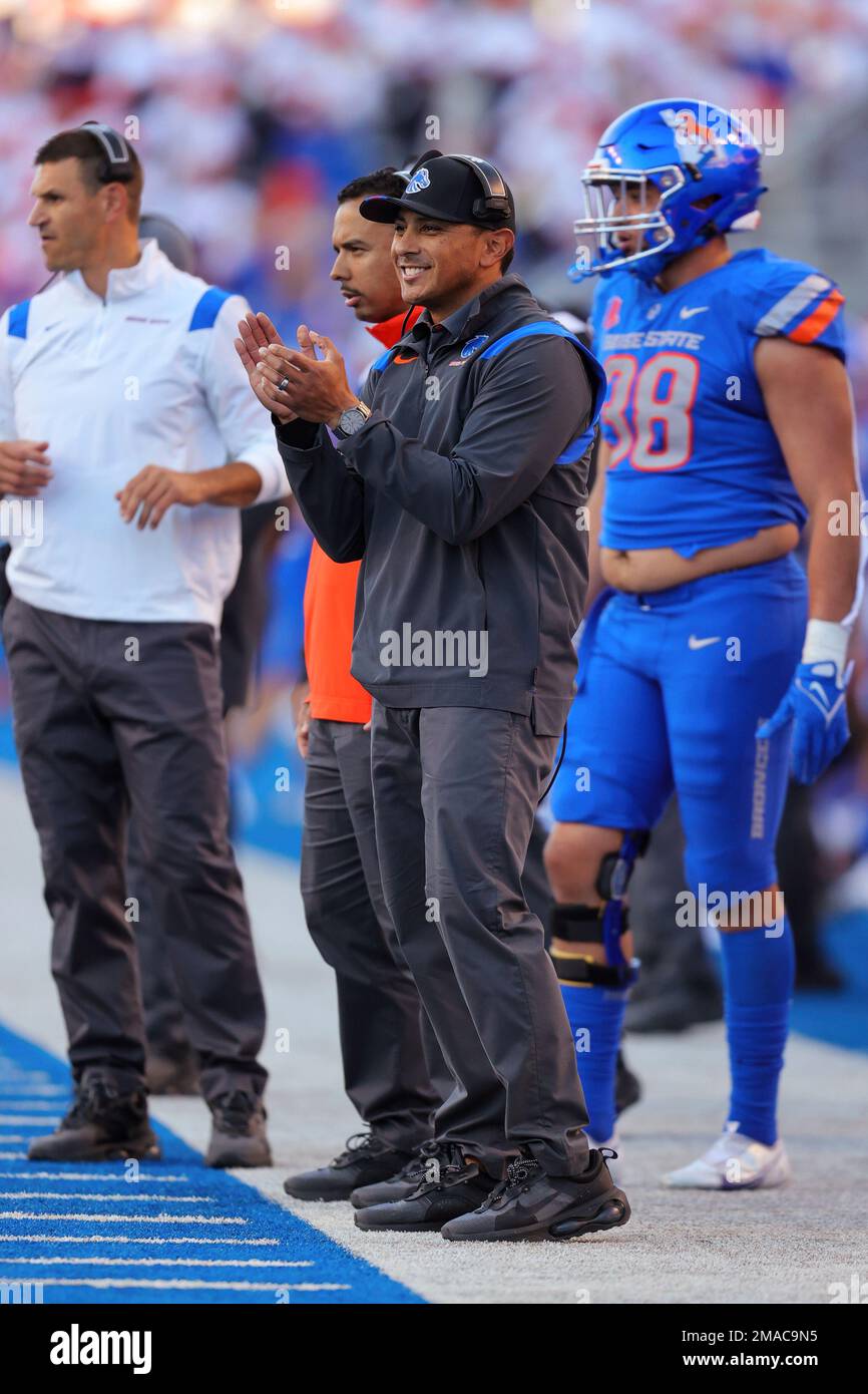 Boise State coach Andy Avalos claps after a penalty was called against ...