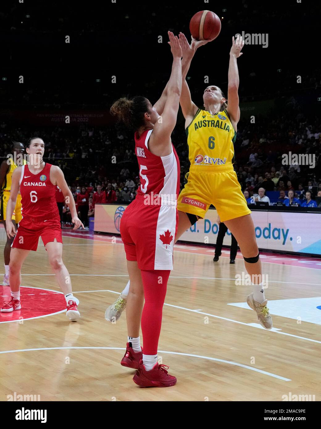 Australia's Steph Talbot attempts a shot at goal as Canada's Kia Nurse ...