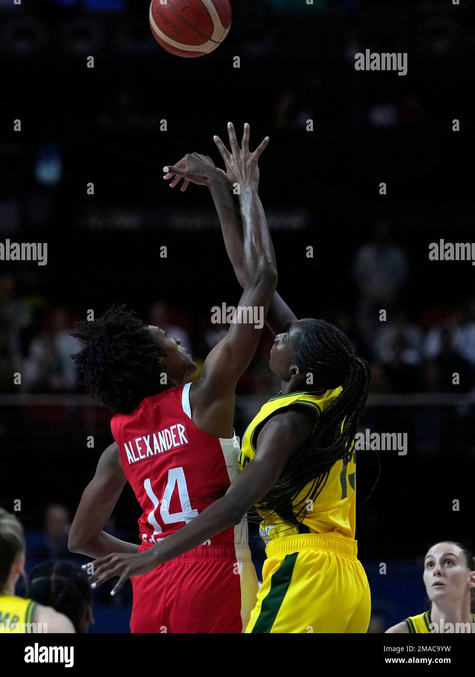 Canada's Kayla Alexander, left, and Australia's Ezi Magbegor jump for ...