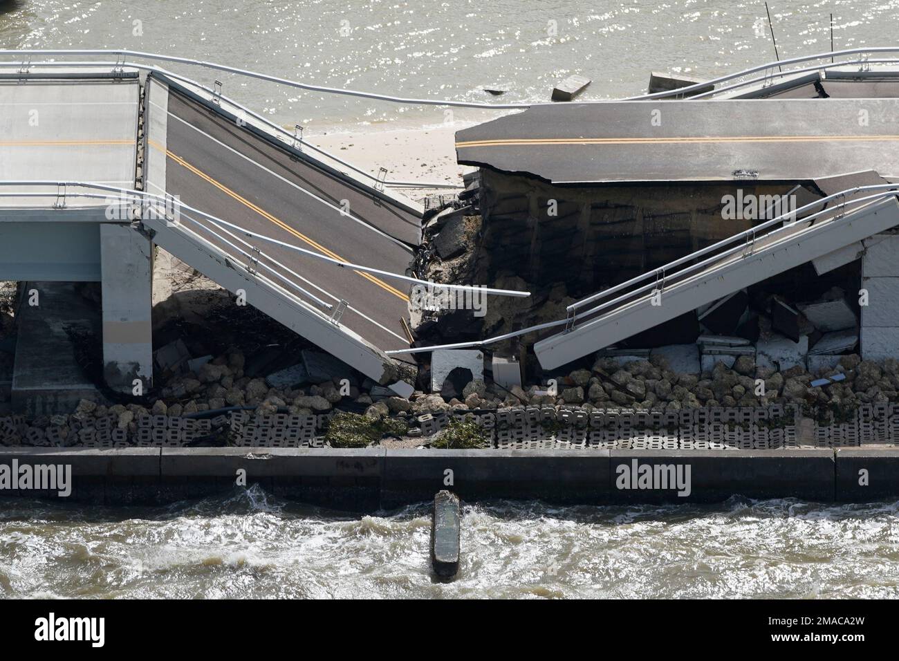 A damaged causeway to Sanibel Island is seen in the aftermath of ...