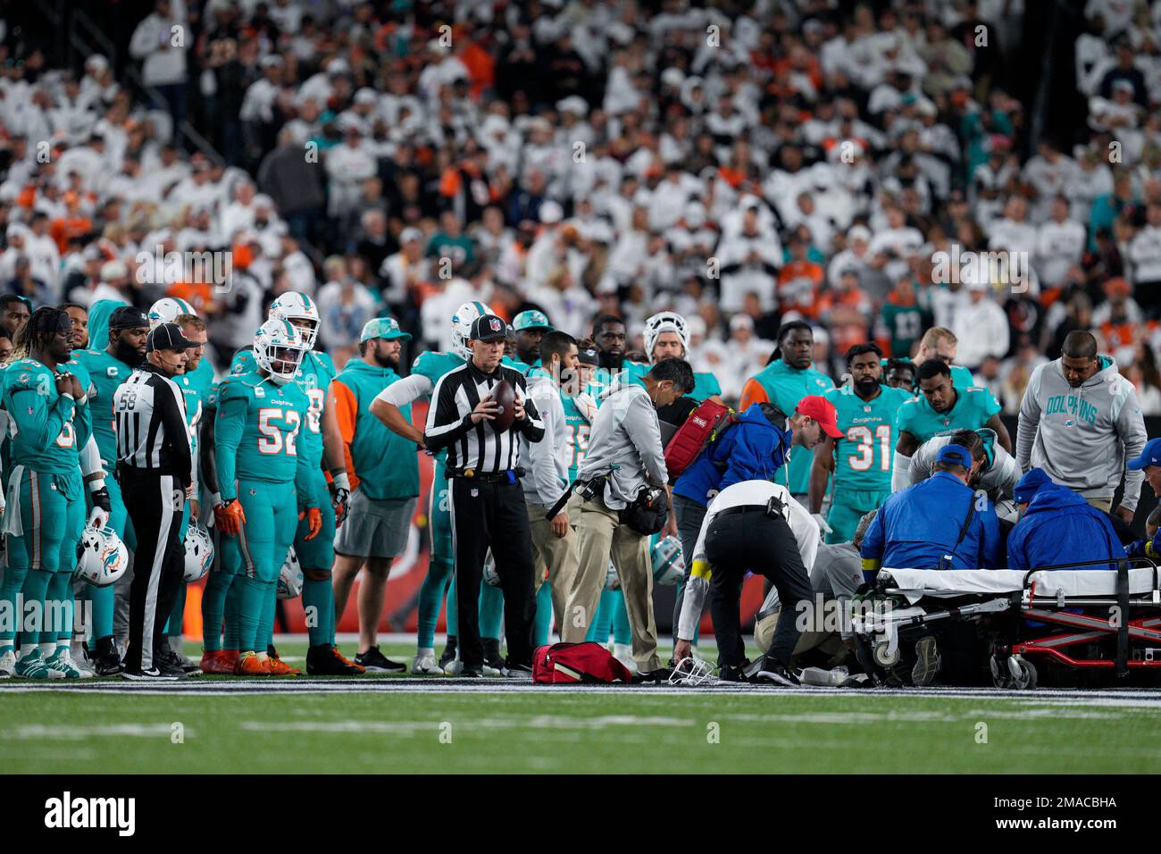 Miami Dolphins quarterback Tua Tagovailoa is attended to by medical ...