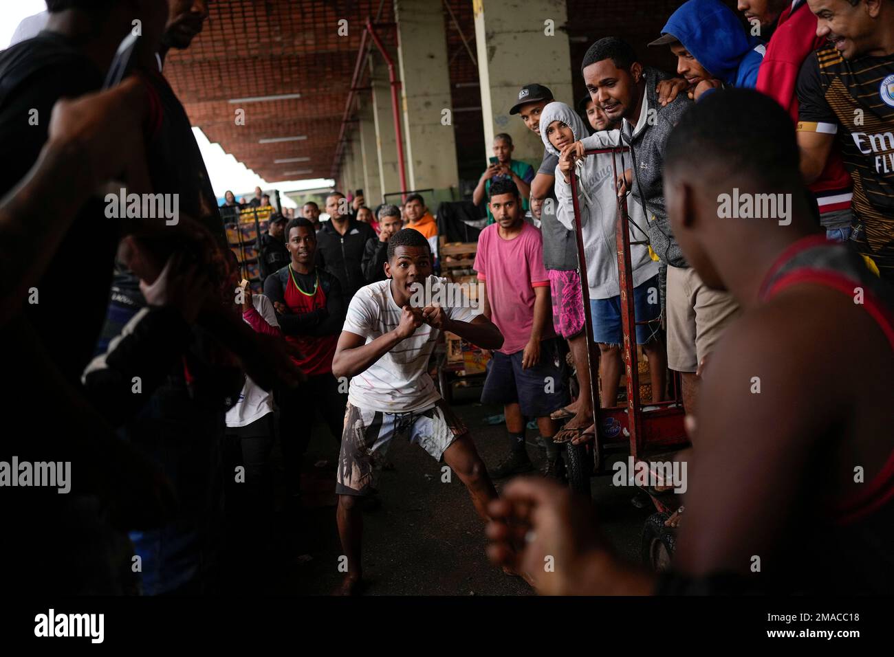 Cart pushers clench their fists threatening to start a fight after ...