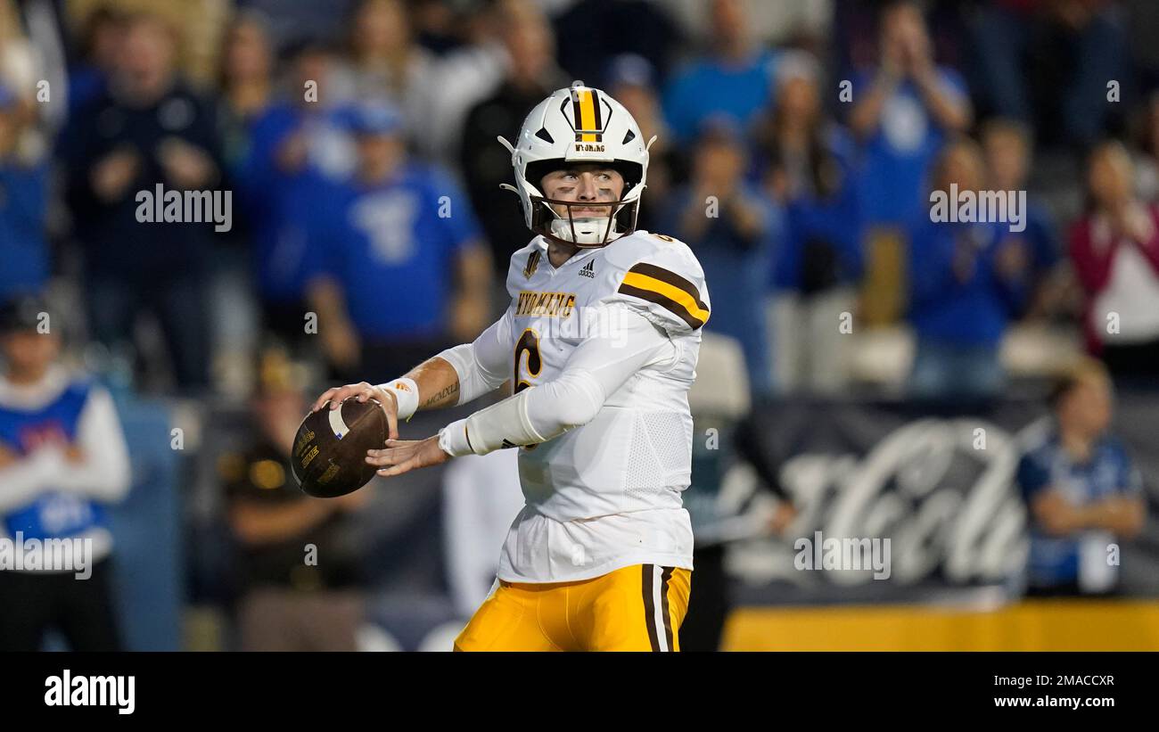 Wyoming quarterback Andrew Peasley (6) throws downfield during the ...