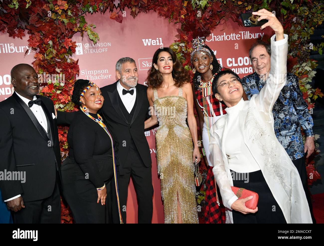 "Oumda" Alfateh Younous Haroun, left, Wanjiru Wahome, George Clooney ...