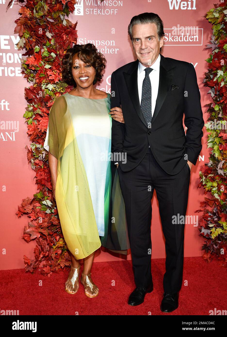 Alfre Woodard, left, and husband Roderick Spencer attend the Clooney ...