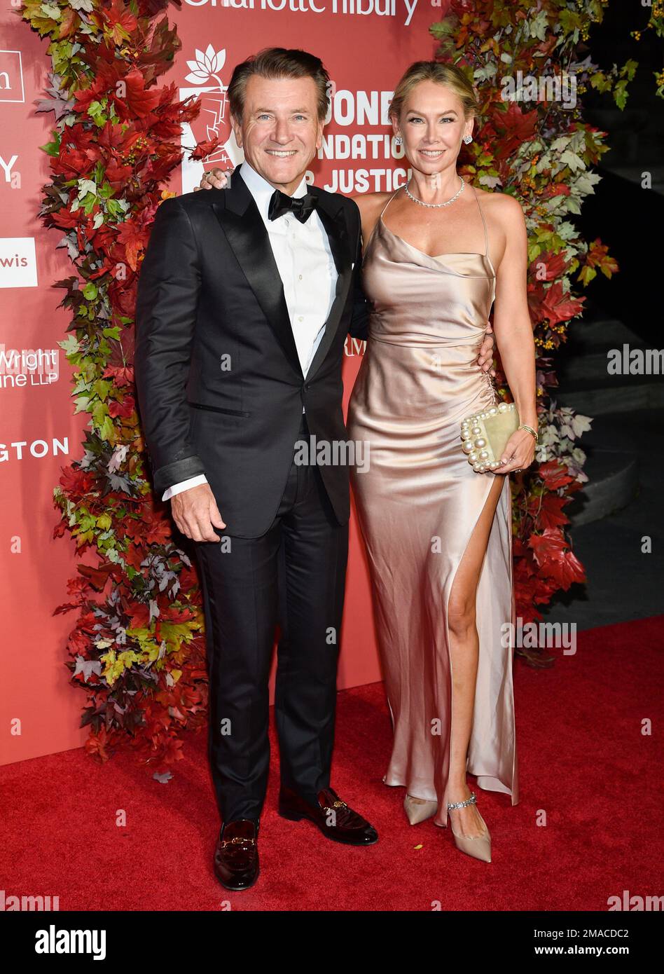 Robert Herjavec, left, and wife Kym Johnson Herjavec attend the Clooney ...